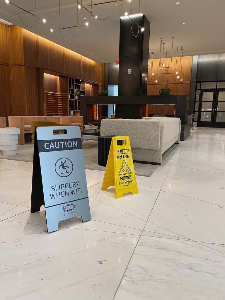 Your building deserves the best wet floor signs - Cadwell Design + Sign